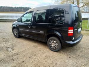 Black Volkswagen Caddy 2013 in Riga, with an engine capacity of 1.60 L and mileage of 223 thousand km for 6698 €, photo 2 on AUTOMOTO.COM.LV