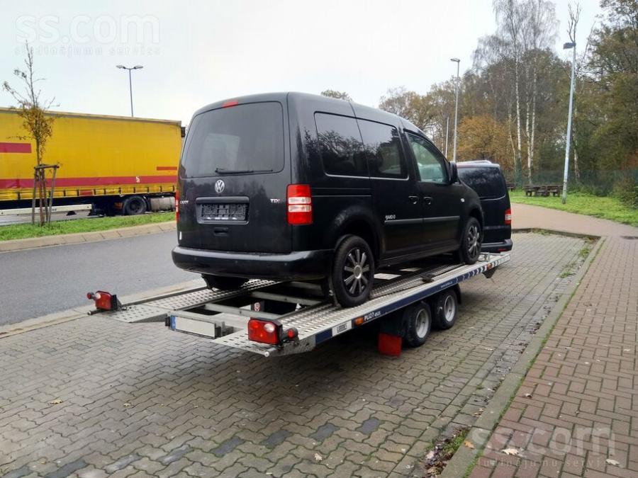 Black Volkswagen Caddy 2013 in Riga, with an engine capacity of 1.60 L and mileage of 223 thousand km for 6698 €, photo 26 on AUTOMOTO.COM.LV