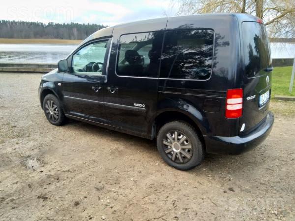 Black Volkswagen Caddy 2013 in Riga, with an engine capacity of 1.60 L and mileage of 223 thousand km for 6368 €, photo 3 on AUTOMOTO.COM.LV