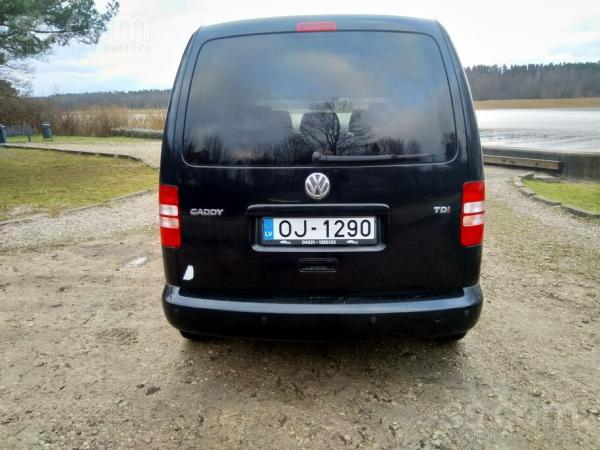 Black Volkswagen Caddy 2013 in Riga, with an engine capacity of 1.60 L and mileage of 223 thousand km for 6368 €, photo 4 on AUTOMOTO.COM.LV