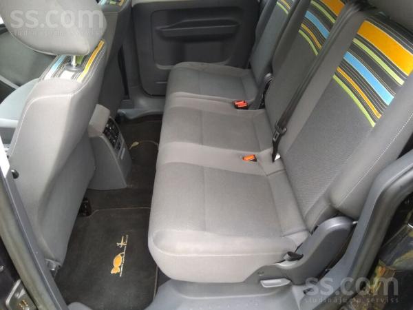 Black Volkswagen Caddy 2013 in Riga, with an engine capacity of 1.60 L and mileage of 223 thousand km for 6368 €, photo 8 on AUTOMOTO.COM.LV