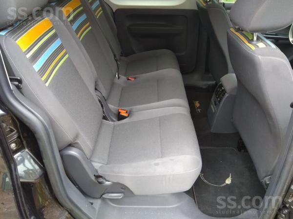 Black Volkswagen Caddy 2013 in Riga, with an engine capacity of 1.60 L and mileage of 223 thousand km for 6368 €, photo 10 on AUTOMOTO.COM.LV