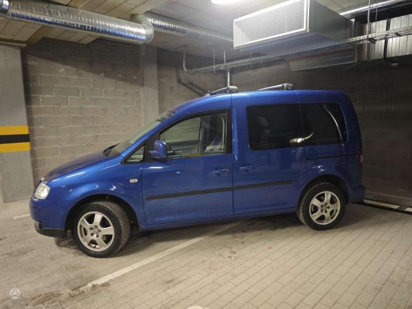 Blue Volkswagen Caddy 2009 in Vilnius, with an engine capacity of 1.90 L and mileage of 317 thousand km for 3300 €, photo 2 on AUTOMOTO.COM.LV