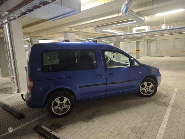 Blue Volkswagen Caddy 2009 in Vilnius, with an engine capacity of 1.90 L and mileage of 317 thousand km for 3300 €, photo 4 on AUTOMOTO.COM.LV