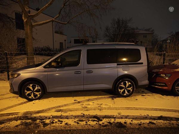 Blue Volkswagen Caddy 2023 in Kaunas, with an engine capacity of 1.97 L and mileage of 200 thousand km for 15900 €, photo 2 on AUTOMOTO.COM.LV