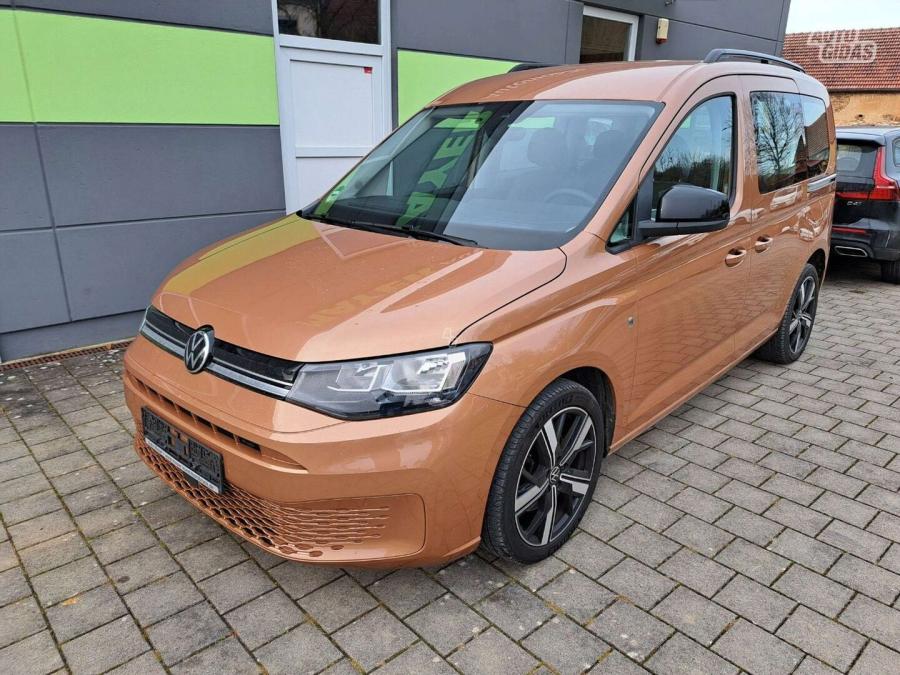Brown Volkswagen Caddy 2021 in Kaunas, with an engine capacity of 2.00 L and mileage of 92 thousand km for 23945 €, photo 2 on AUTOMOTO.COM.LV