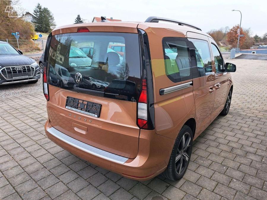 Brown Volkswagen Caddy 2021 in Kaunas, with an engine capacity of 2.00 L and mileage of 92 thousand km for 23945 €, photo 4 on AUTOMOTO.COM.LV