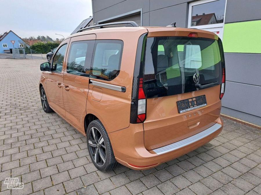 Brown Volkswagen Caddy 2021 in Kaunas, with an engine capacity of 2.00 L and mileage of 92 thousand km for 23945 €, photo 5 on AUTOMOTO.COM.LV