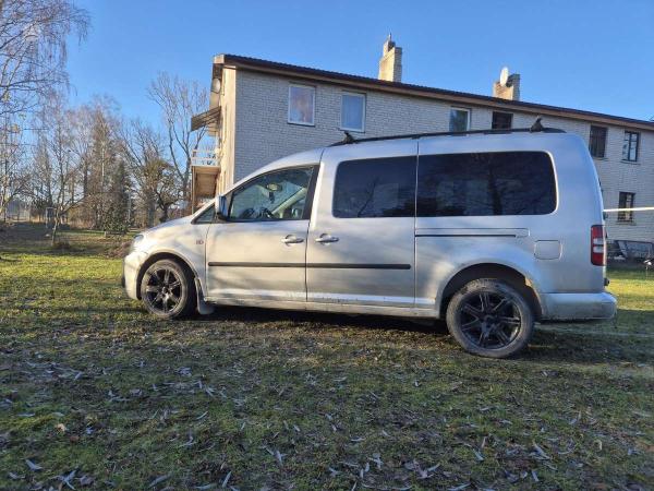 Grey Volkswagen Caddy 2010 in Vilnius, with an engine capacity of 1.99 L and mileage of 700 thousand km for 1900 €, photo 4 on AUTOMOTO.COM.LV