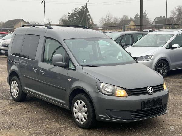 Grey Volkswagen Caddy 2011 in Kedainiai, with an engine capacity of 1.20 L and mileage of 254 thousand km for 3999 €, photo 1 on AUTOMOTO.COM.LV
