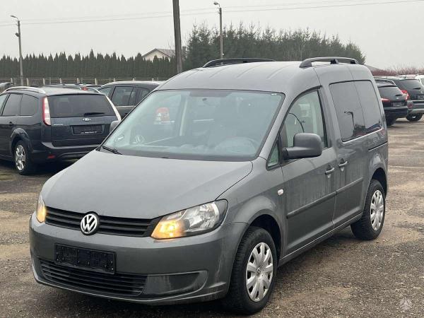 Grey Volkswagen Caddy 2011 in Kedainiai, with an engine capacity of 1.20 L and mileage of 254 thousand km for 3999 €, photo 2 on AUTOMOTO.COM.LV
