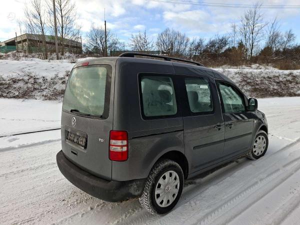 Grey Volkswagen Caddy 2011 in Vilnius, with an engine capacity of 1.60 L and mileage of 270 thousand km for 5850 €, photo 3 on AUTOMOTO.COM.LV