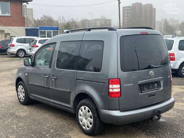 Grey Volkswagen Caddy 2011 in Kedainiai, with an engine capacity of 1.20 L and mileage of 254 thousand km for 3999 €, photo 4 on AUTOMOTO.COM.LV