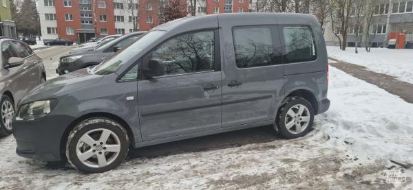 Grey Volkswagen Caddy 2012 in Vilnius, with an engine capacity of 1.20 L and mileage of 212 thousand km for 4950 €, photo 2 on AUTOMOTO.COM.LV