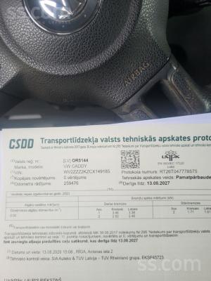 Grey Volkswagen Caddy 2012 in Riga, with an engine capacity of 1.60 L and mileage of 259 thousand km for 4350 €, photo 7 on AUTOMOTO.COM.LV