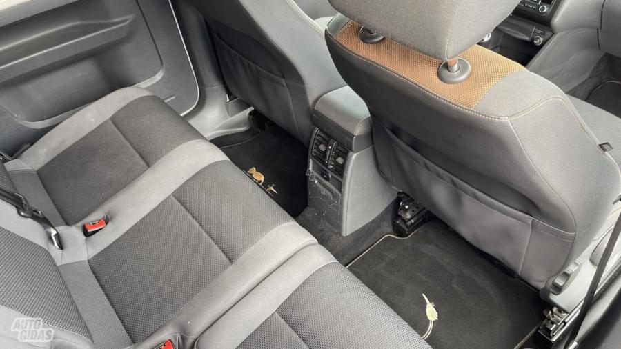 Grey Volkswagen Caddy 2013 in Marijampole, with an engine capacity of 1.60 L and mileage of 261 thousand km for 7690 €, photo 15 on AUTOMOTO.COM.LV