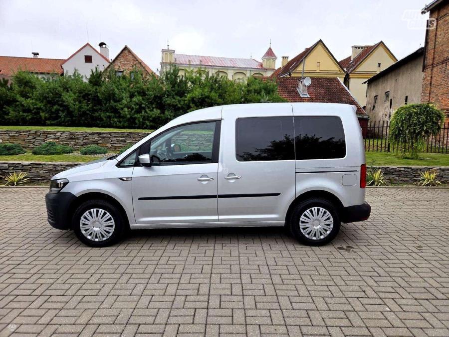 Grey Volkswagen Caddy 2015 in Vilnius, with an engine capacity of 2.00 L and mileage of 280 thousand km for 8800 €, photo 5 on AUTOMOTO.COM.LV