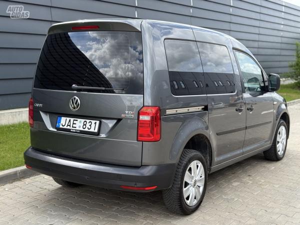 Grey Volkswagen Caddy 2015 in Vilnius, with an engine capacity of 2.00 L and mileage of 159 thousand km for 10500 €, photo 3 on AUTOMOTO.COM.LV