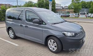 Grey Volkswagen Caddy 2023 in Riga, with an engine capacity of 2.00 L and mileage of 57 thousand km for 24900 €, photo  on AUTOMOTO.COM.LV