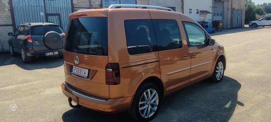 Orange Volkswagen Caddy 2015 in Sirvintos, with an engine capacity of 2.00 L and mileage of 170 thousand km for 14400 €, photo 4 on AUTOMOTO.COM.LV