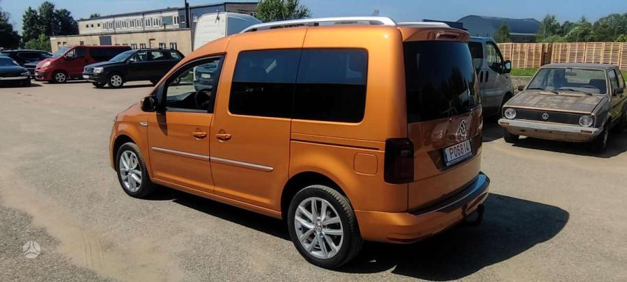 Orange Volkswagen Caddy 2015 in Sirvintos, with an engine capacity of 2.00 L and mileage of 170 thousand km for 14400 €, photo 5 on AUTOMOTO.COM.LV