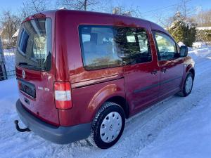 Red Volkswagen Caddy 2009 in Kelme, with an engine capacity of 1.90 L and mileage of 240 thousand km for 3250 €, photo 4 on AUTOMOTO.COM.LV