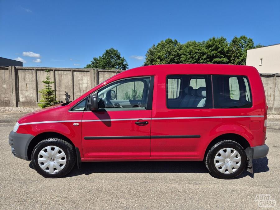 Red Volkswagen Caddy 2009 in Mazeikiai, with an engine capacity of 1.90 L and mileage of 295 thousand km for 4350 €, photo 3 on AUTOMOTO.COM.LV