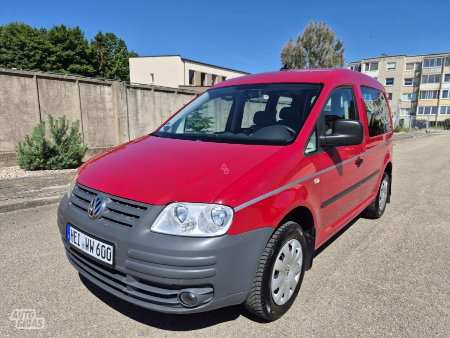 Red Volkswagen Caddy 2009 in Mazeikiai, with an engine capacity of 1.90 L and mileage of 295 thousand km for 4350 €, photo 1 on AUTOMOTO.COM.LV