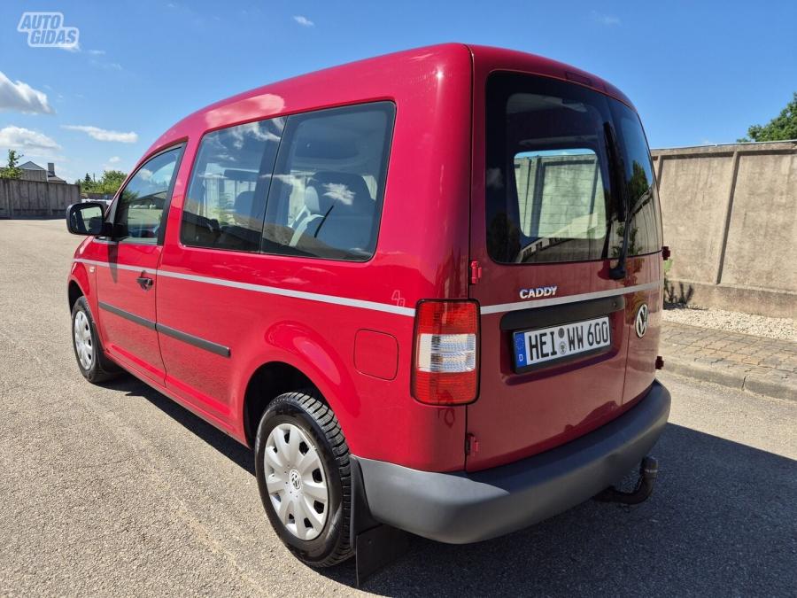 Red Volkswagen Caddy 2009 in Mazeikiai, with an engine capacity of 1.90 L and mileage of 295 thousand km for 4350 €, photo 4 on AUTOMOTO.COM.LV