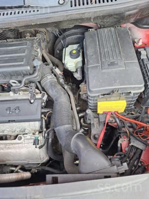 Red Volkswagen Caddy 2009 in Daugavpils, with an engine capacity of 1.40 L and mileage of 206 thousand km for 4300 €, photo 12 on AUTOMOTO.COM.LV