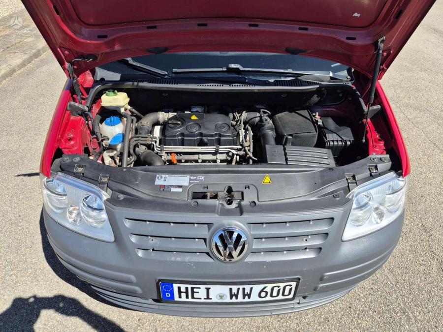Red Volkswagen Caddy 2009 in Mazeikiai, with an engine capacity of 1.90 L and mileage of 295 thousand km for 4199 €, photo 12 on AUTOMOTO.COM.LV