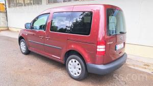 Red Volkswagen Caddy 2010 in Ogre, with an engine capacity of 1.20 L and mileage of 268 thousand km for 5950 €, photo 3 on AUTOMOTO.COM.LV