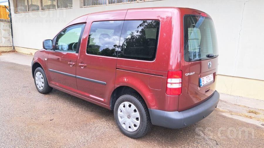 Red Volkswagen Caddy 2010 in Ogre, with an engine capacity of 1.20 L and mileage of 268 thousand km for 5950 €, photo 3 on AUTOMOTO.COM.LV