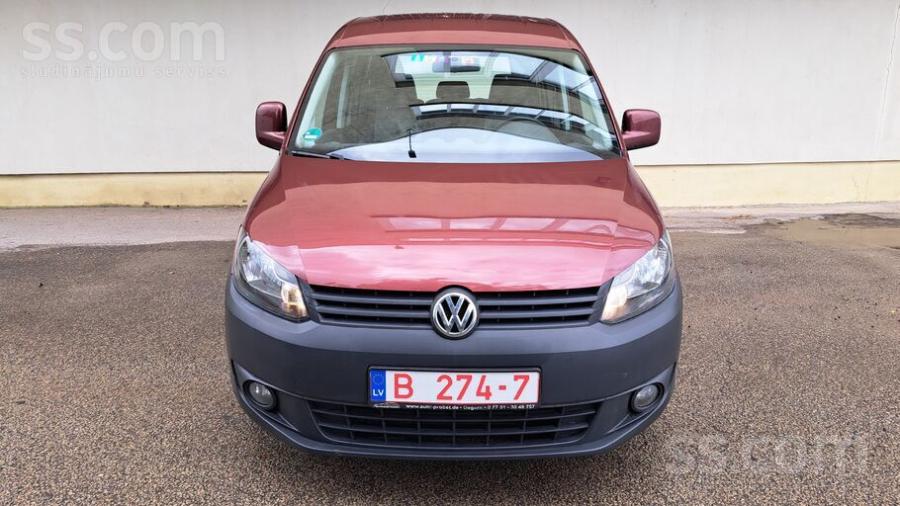 Red Volkswagen Caddy 2010 in Ogre, with an engine capacity of 1.20 L and mileage of 268 thousand km for 5950 €, photo 4 on AUTOMOTO.COM.LV