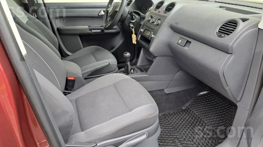 Red Volkswagen Caddy 2010 in Ogre, with an engine capacity of 1.20 L and mileage of 268 thousand km for 5950 €, photo 19 on AUTOMOTO.COM.LV