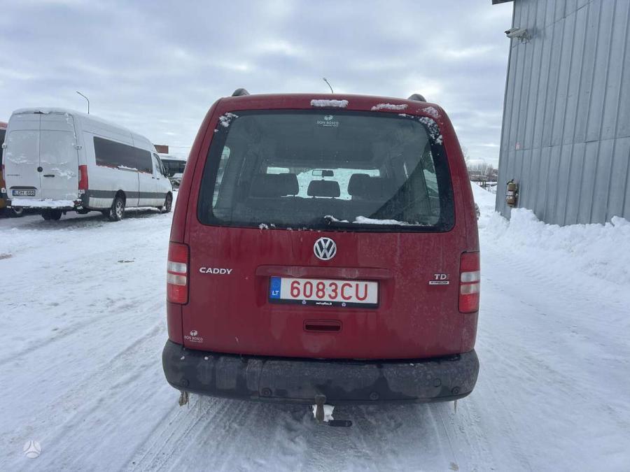 Red Volkswagen Caddy 2011 in Siauliai, with an engine capacity of 1.60 L and mileage of 294 thousand km for 4950 €, photo 5 on AUTOMOTO.COM.LV