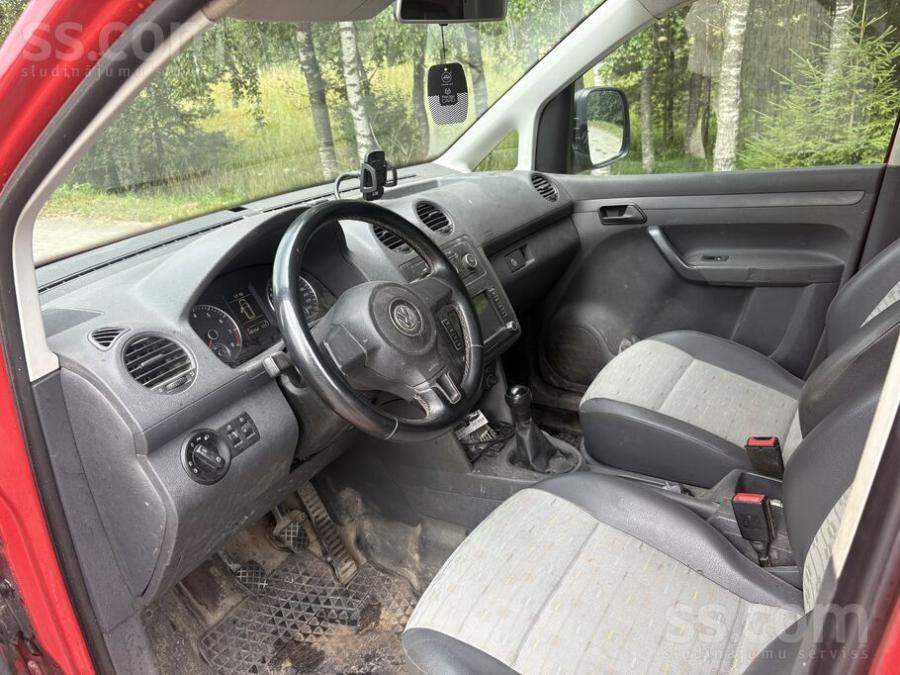 Red Volkswagen Caddy 2012 in Liepaja, with an engine capacity of 2.00 L and mileage of 246 thousand km for 3650 €, photo 6 on AUTOMOTO.COM.LV