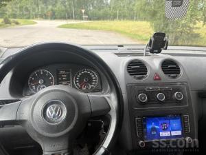 Red Volkswagen Caddy 2012 in Liepaja, with an engine capacity of 2.00 L and mileage of 246 thousand km for 3650 €, photo 7 on AUTOMOTO.COM.LV