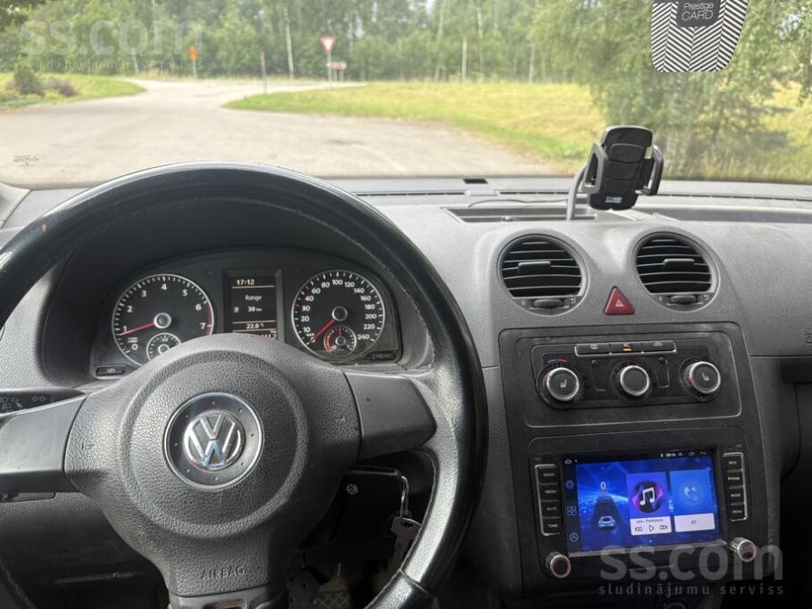 Red Volkswagen Caddy 2012 in Liepaja, with an engine capacity of 2.00 L and mileage of 246 thousand km for 3650 €, photo 7 on AUTOMOTO.COM.LV