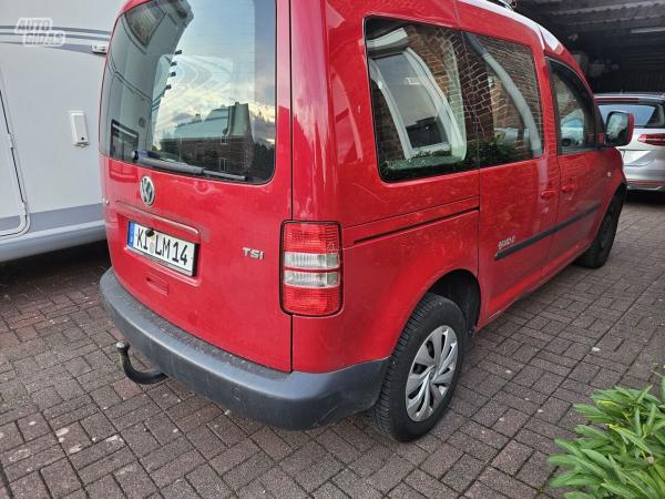 Red Volkswagen Caddy 2013 in Kluonaliai, with an engine capacity of 1.20 L and mileage of 198 thousand km for 4499 €, photo 5 on AUTOMOTO.COM.LV