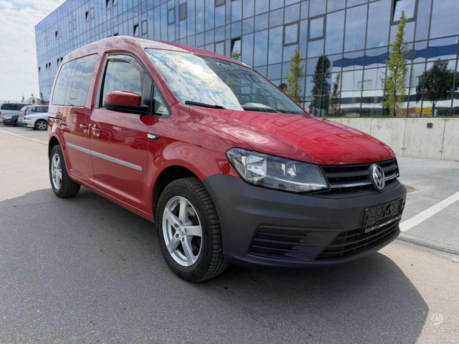 Red Volkswagen Caddy 2016 in Panevezys, with an engine capacity of 1.97 L and mileage of 284 thousand km for 7250 €, photo 1 on AUTOMOTO.COM.LV