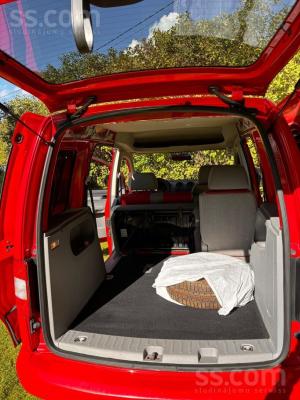 Red Volkswagen Caddy 2009 in Ogre, with an engine capacity of 1.40 L and mileage of 250 thousand km for 3600 €, photo 6 on AUTOMOTO.COM.LV