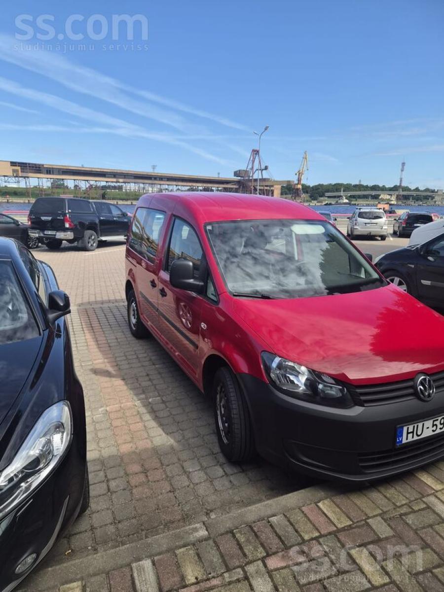 Red Volkswagen Caddy 2011 in Ventspils, with an engine capacity of 1.60 L and mileage of 91 thousand km for 5100 €, photo 1 on AUTOMOTO.COM.LV