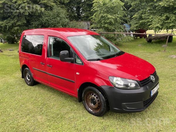 Red Volkswagen Caddy 2014 in Riga, with an engine capacity of 1.60 L and mileage of 521 thousand km for 2300 €, photo 1 on AUTOMOTO.COM.LV