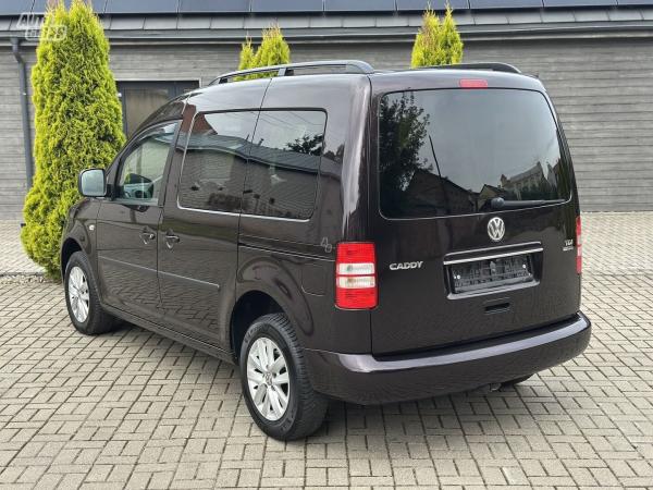 Violet Volkswagen Caddy 2011 in Kedainiai, with an engine capacity of 1.60 L and mileage of 236 thousand km for 6800 €, photo 3 on AUTOMOTO.COM.LV