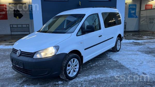 White Volkswagen Caddy 2014 in Riga, with an engine capacity of 2.00 L and mileage of 257 thousand km for 7600 €, photo 1 on AUTOMOTO.COM.LV