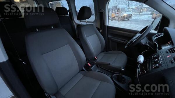 White Volkswagen Caddy 2014 in Riga, with an engine capacity of 2.00 L and mileage of 257 thousand km for 7600 €, photo 7 on AUTOMOTO.COM.LV