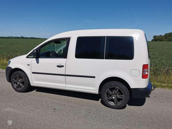 White Volkswagen Caddy 2012 in Kretinga, with an engine capacity of 0.00 L and mileage of 276 thousand km for 5200 €, photo 6 on AUTOMOTO.COM.LV