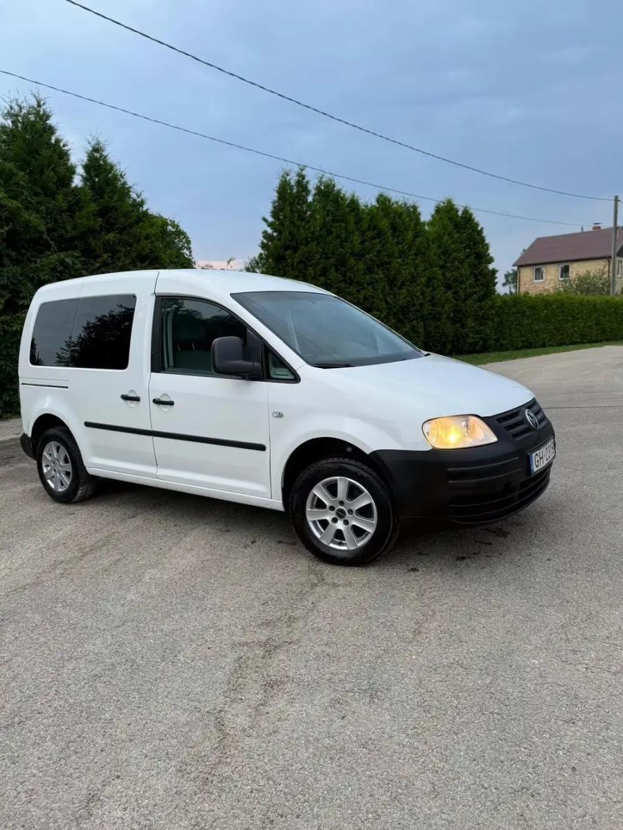 White Volkswagen Caddy 2007 in Riga, with an engine capacity of 1.90 L and mileage of 400 thousand km for 2300 €, photo 4 on AUTOMOTO.COM.LV