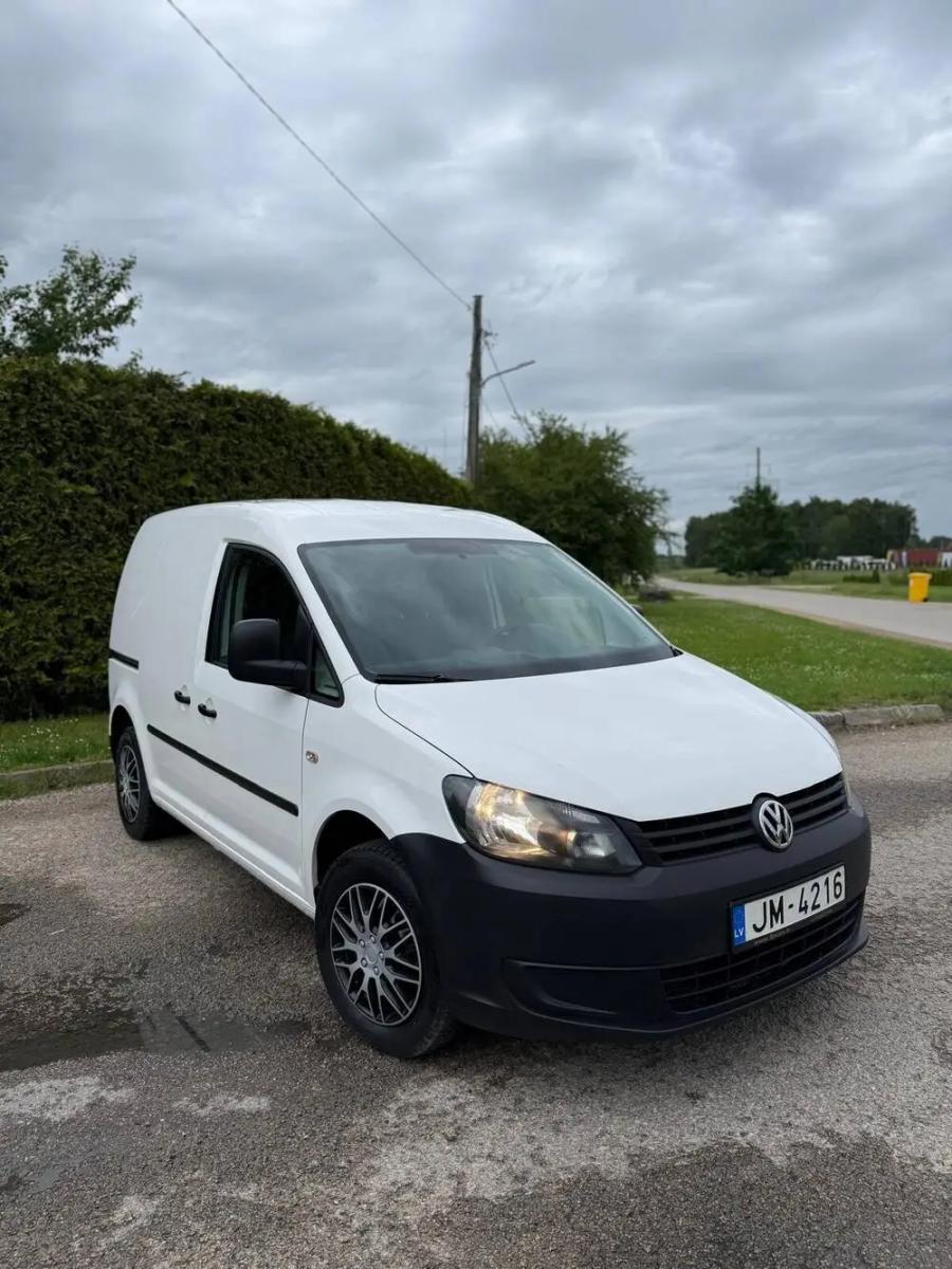 White Volkswagen Caddy 2014 in Riga, with an engine capacity of 1.60 L and mileage of 310 thousand km for 3900 €, photo 3 on AUTOMOTO.COM.LV